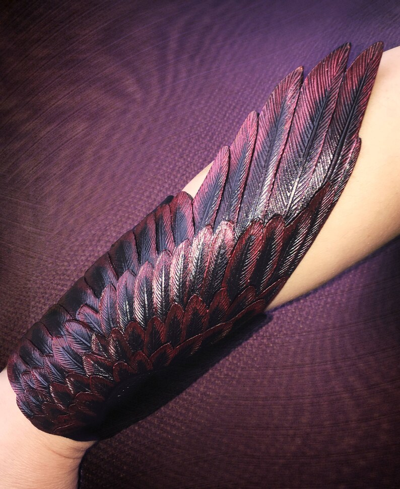 Tooled leather wing cuff with red iridescent sheen Tooled | Etsy