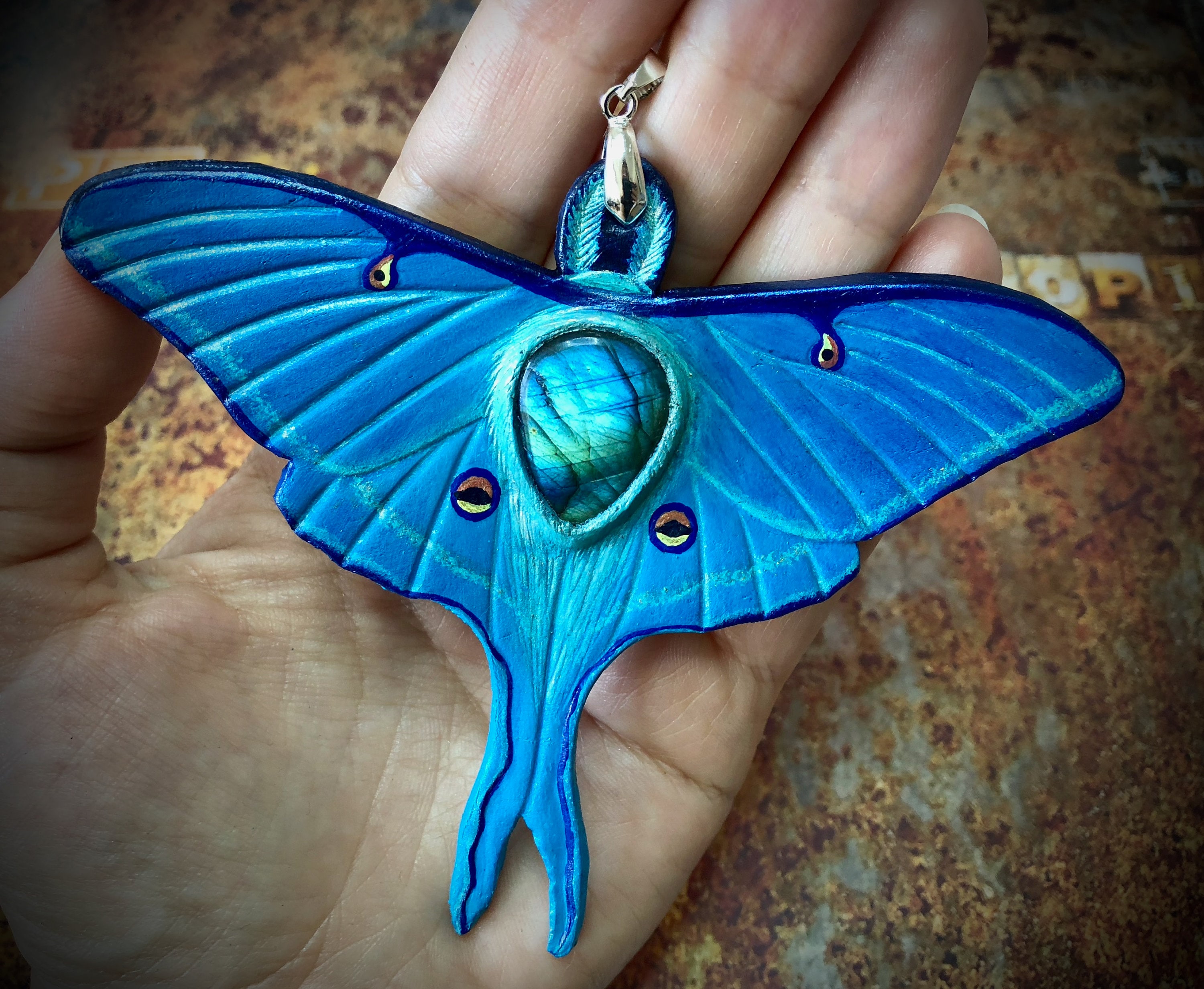 Fantasy tooled leather luna moth pendant with blue labradorite | Etsy