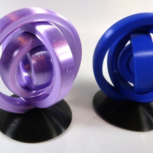 3D Printed FIDGET ROTARY Ring Toy With Free Stand OVER 25 Colors - Etsy