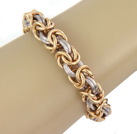 26839 - Rom Germany 18k Yellow Gold & Platinum 9mm B… - Gem