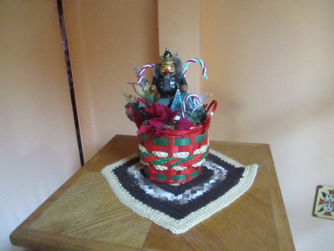 The Forest Nutcracker King in a Christmas Wicker Basket Surrounded by ...