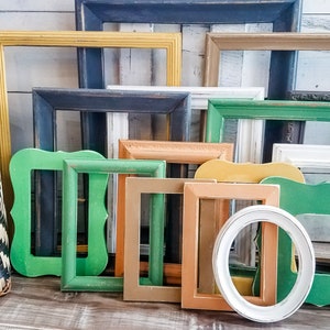 Mismatched Earthy and Urban Botanical Decorative Wall Frames for a ...