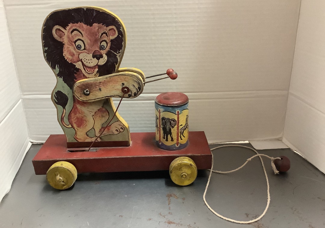 Fisher Price Leo the Dummer Pull Toy - Etsy
