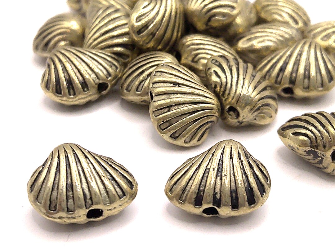 25 Antique Gold Corrugated Shell Beads 8x10mm (6D) - Etsy