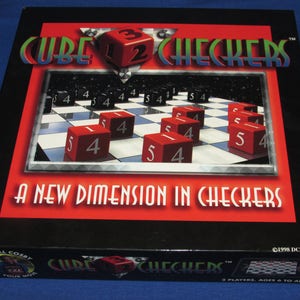 CUBE CHECKERS Game 1998 A New Dimension in Cube Checkers DEP Games ...