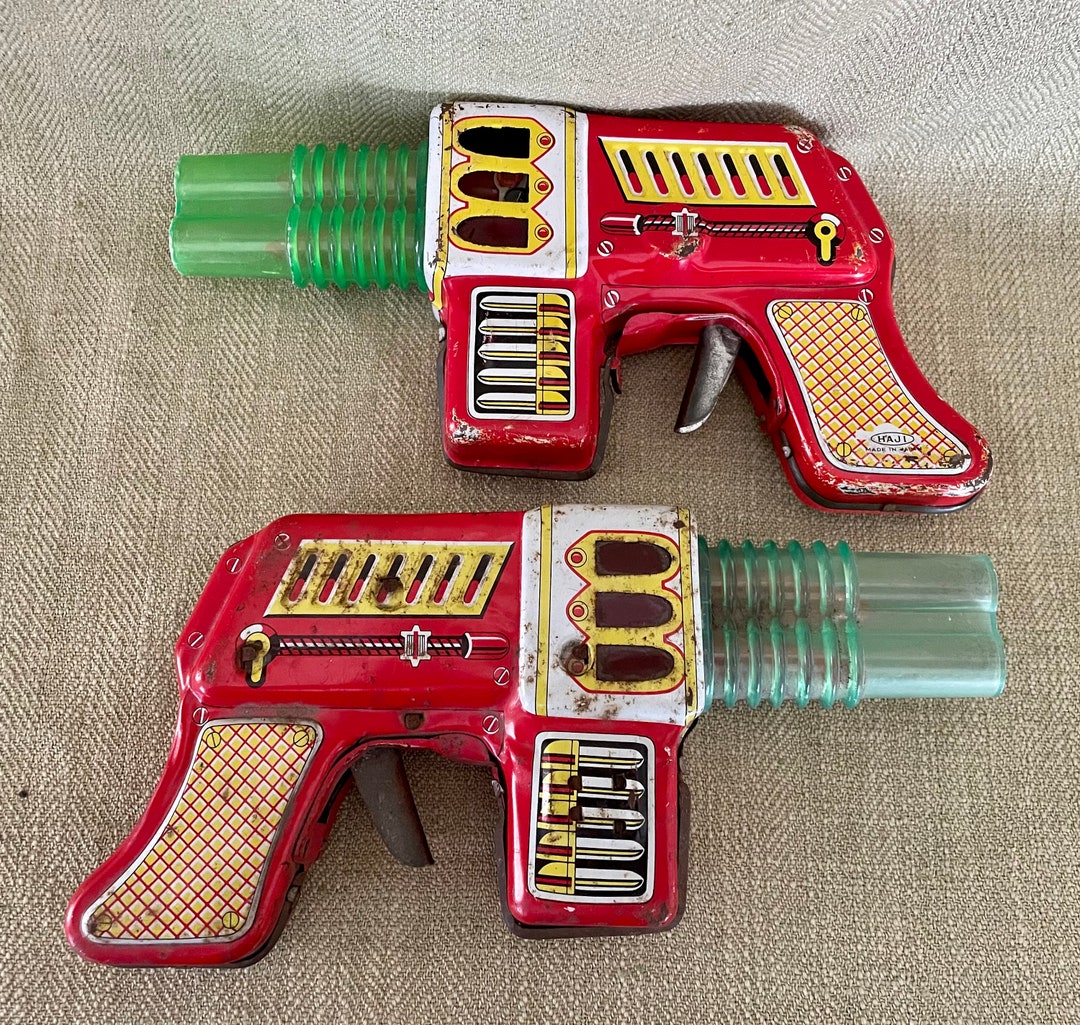 Pair of 1960 Japan Tin Toy Pew Pews - Etsy