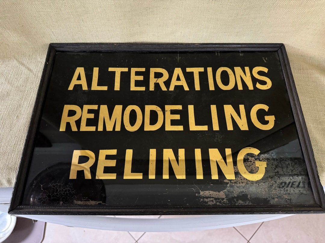 Thinking of a Change? Antique Tailor Shop Alterations Reflective Glass ...