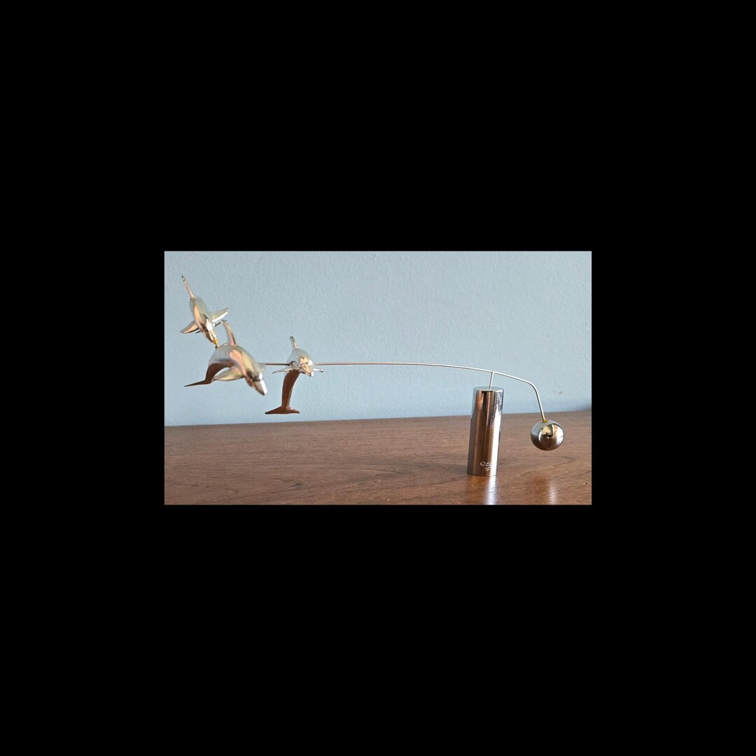 1977 Kinetic Dolphin Desktop Spinner Sculpture. - Etsy