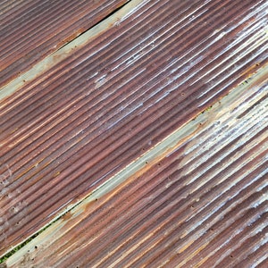 Chocolate Rust With White and Orange Reclaimed Corrugated Metal Roofing ...