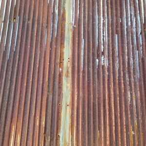 Chocolate Rust With White and Orange Reclaimed Corrugated Metal Roofing ...