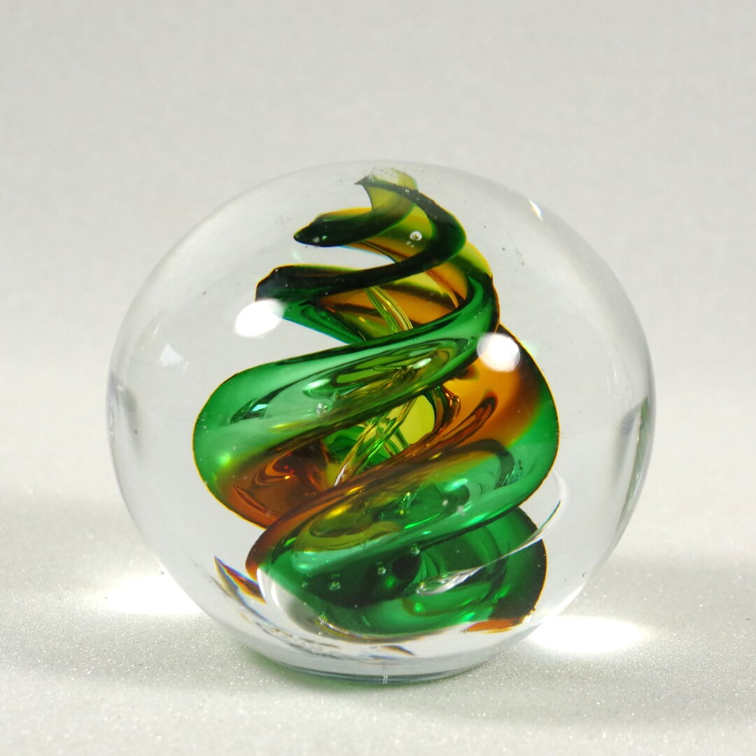 Signed Marian Pyrcak Handblown Crystal Art Glass Paperweight Green And Copper Twist Swirl Globe
