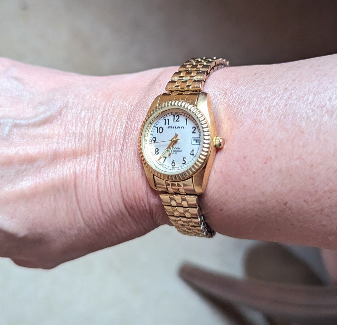 Working Vintage Milan Gold Tone Calendar Unisex Watch With Stretch Band ...
