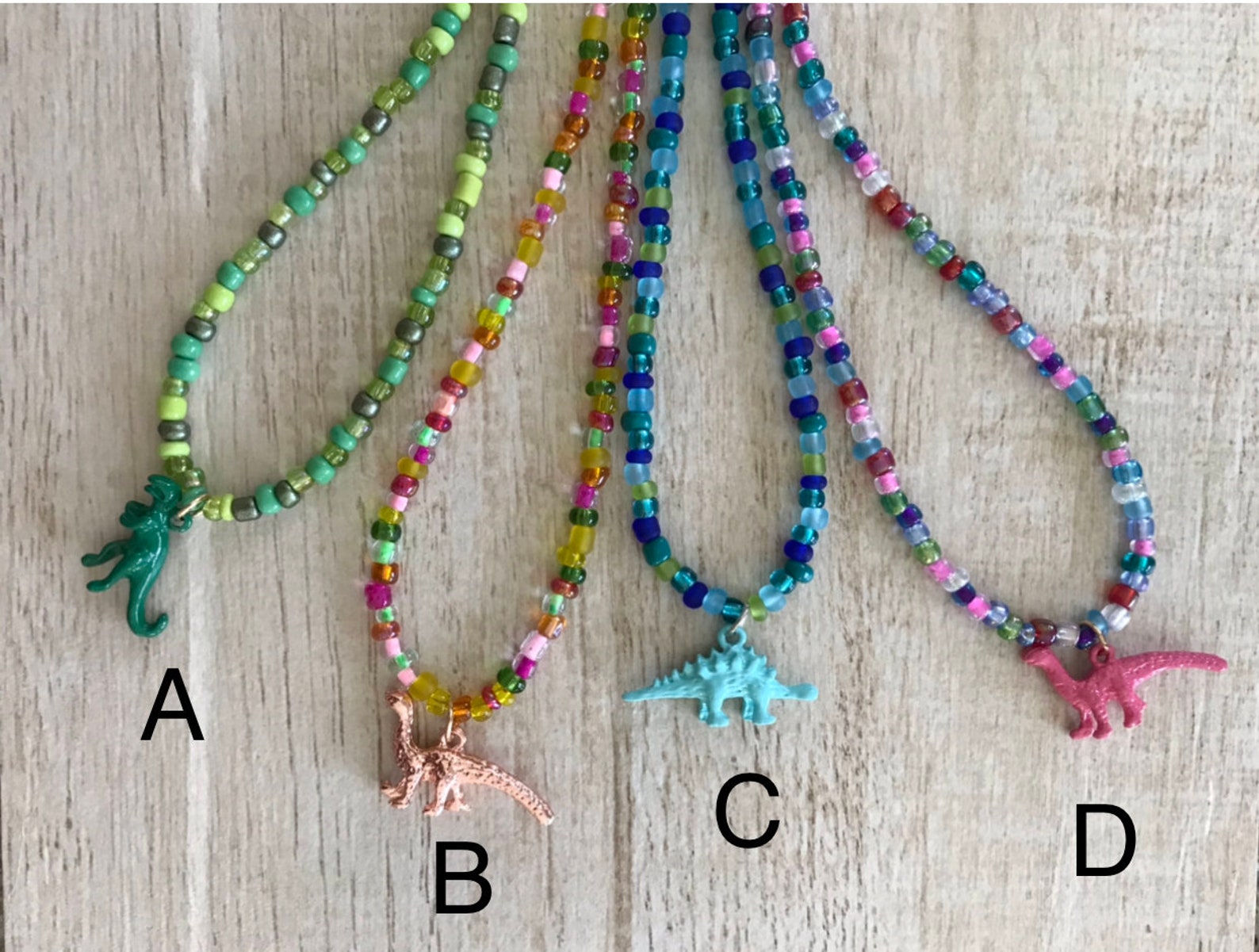 Dinosaur Necklace Tyrannosaurus Brontosaurus Stegosaurus Seed | Etsy