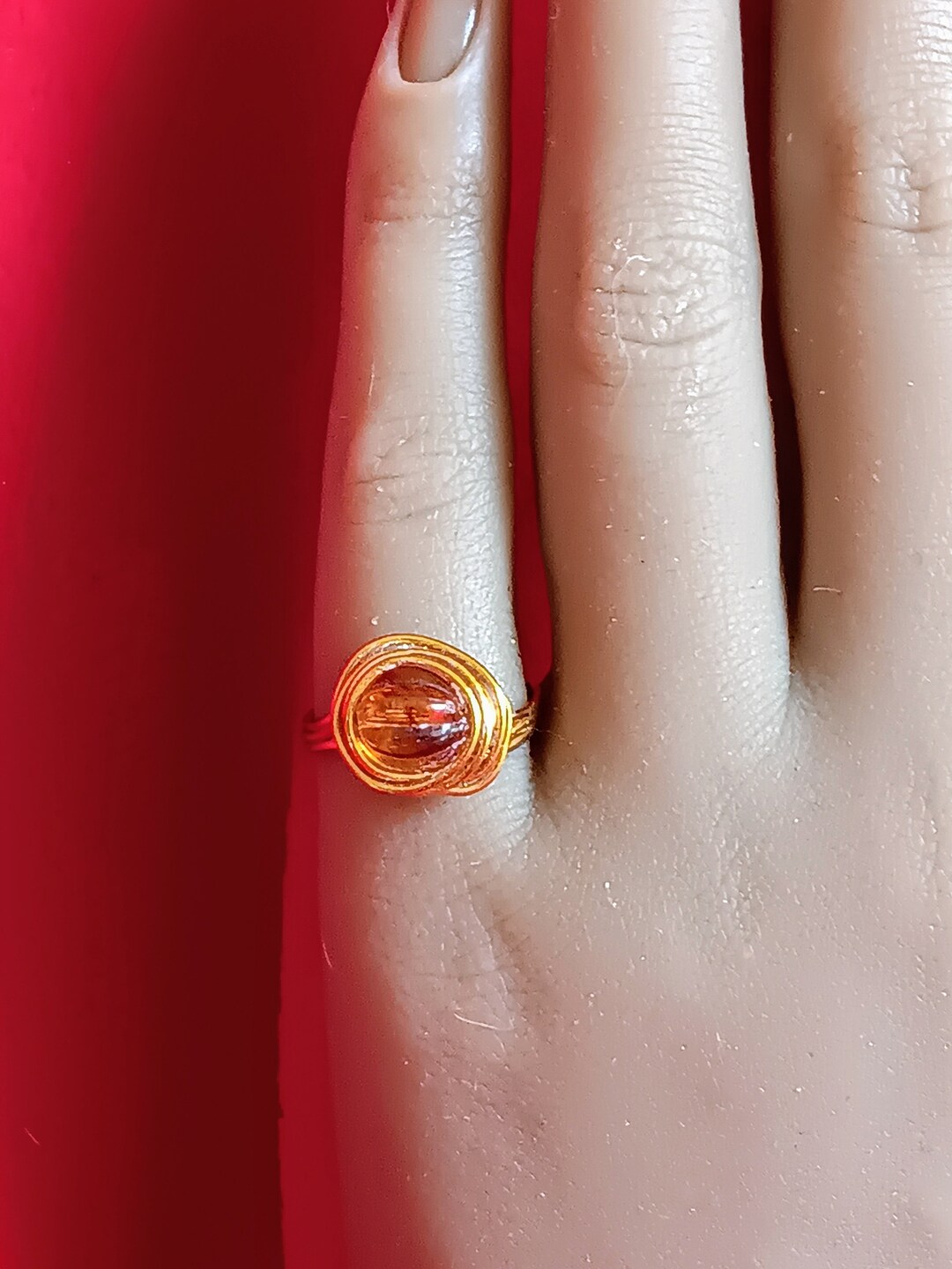 Golden Pinky Ring With Transparent Golden Bead. Ring Band is Also Gold ...