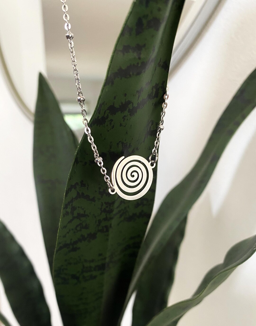 Stainless Steel SPIRAL TWIRL Necklace on a Stainless-steel Satellite ...