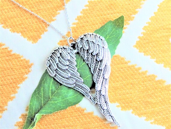LARGE ANGEL WING necklace in antique silver tone on a | Etsy