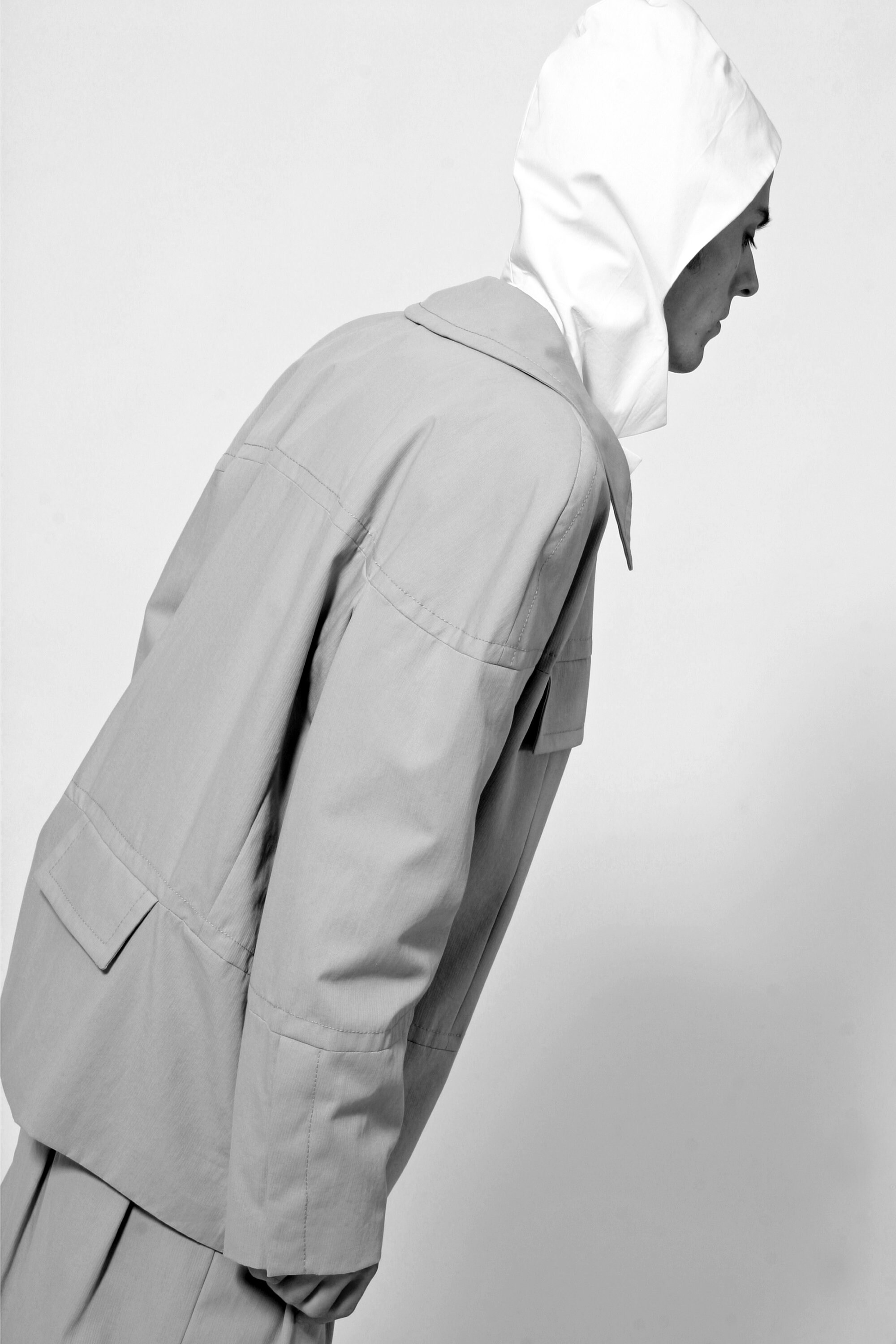 JACKET with overlapping shoulders, concealed closure