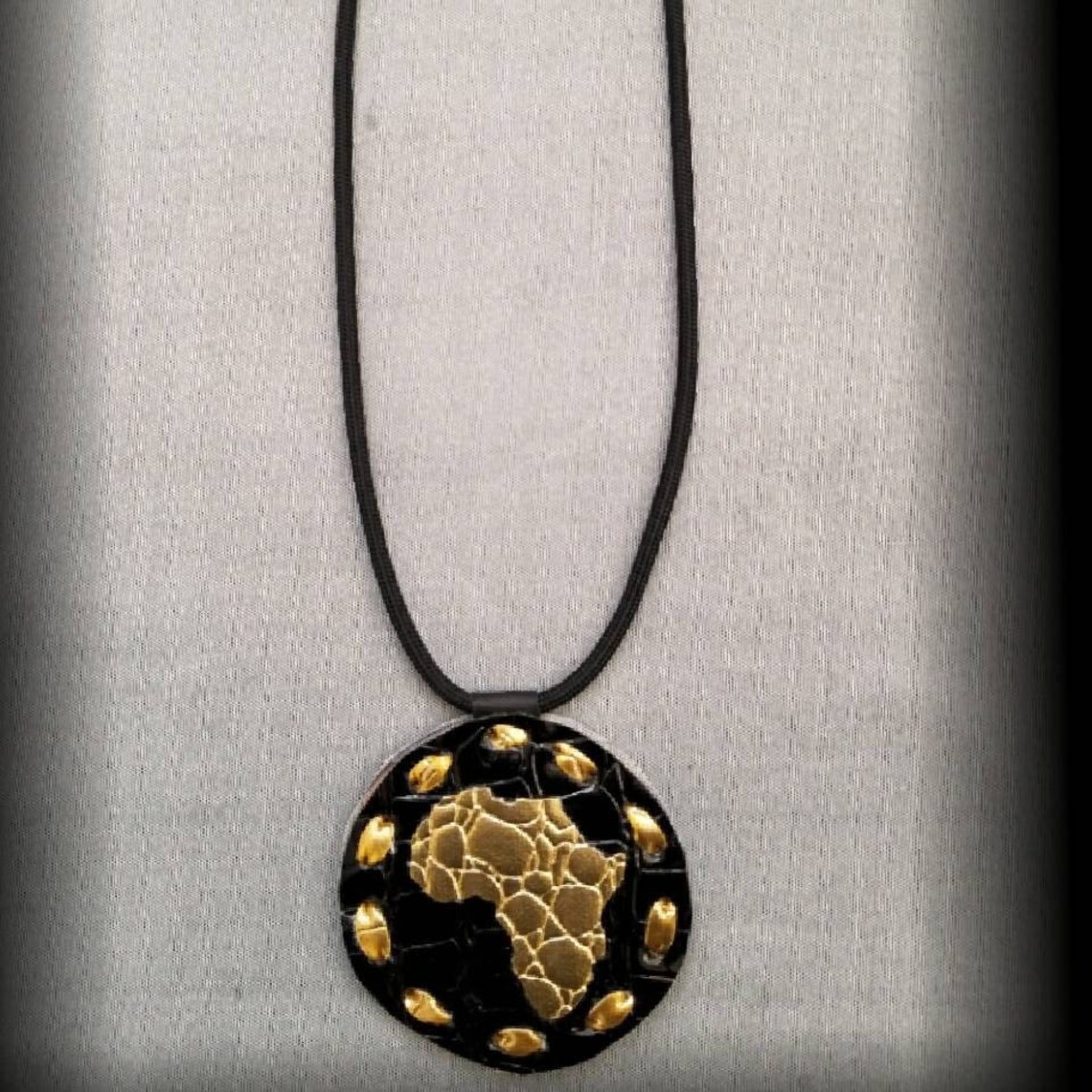 Handmade AFRICAN MEDALLION | Etsy