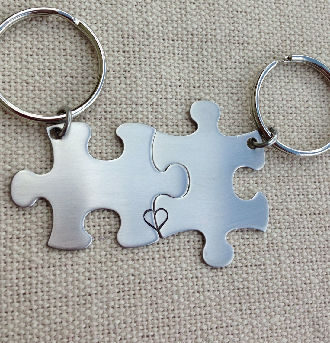 Stainless steel hand stamped puzzle pieces key chains his and | Etsy