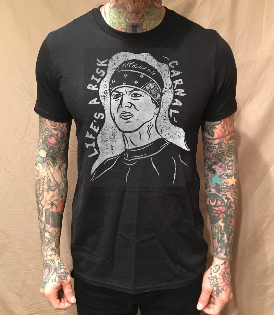 Life's a Risk Carnal Black Tee - Etsy