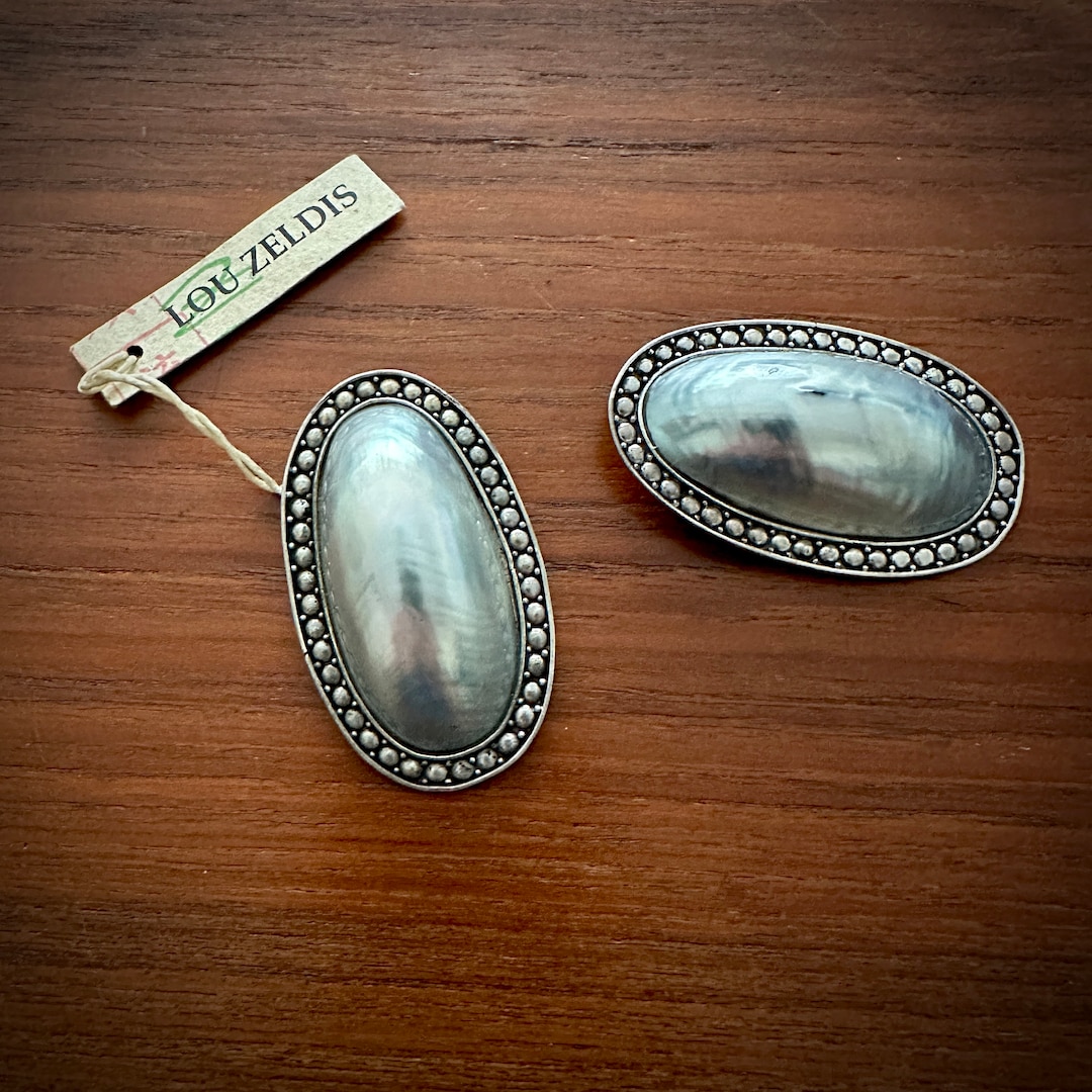 From the Lou Zeldis Collection... Mother of Pearl and Sterling Silver ...