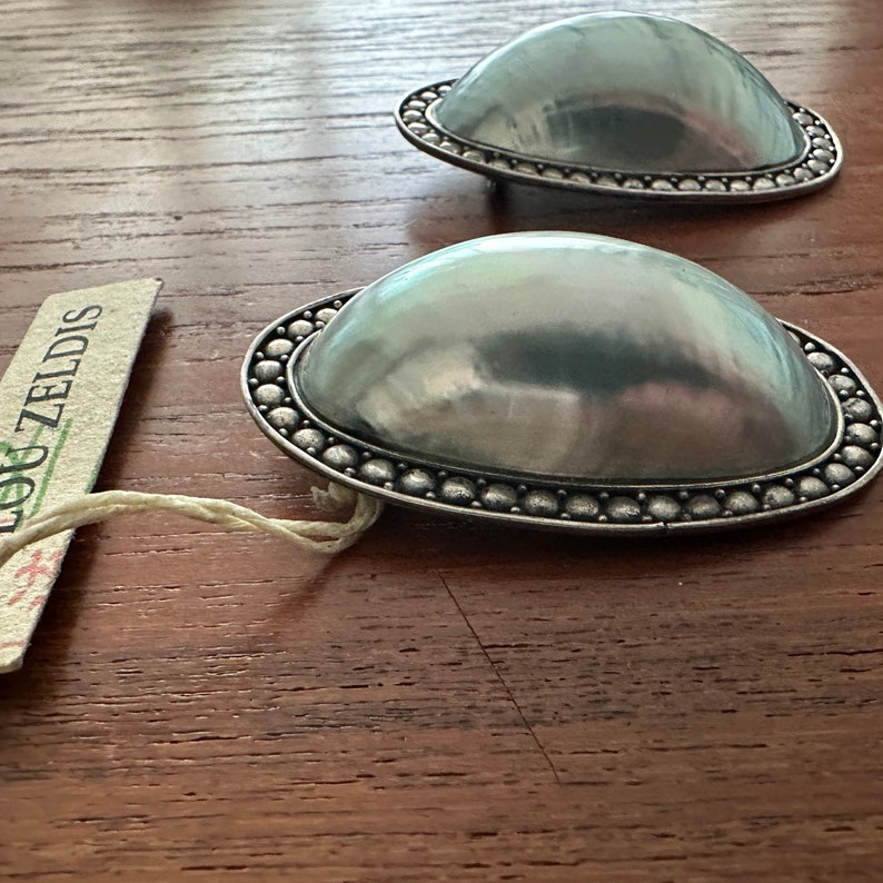 From the Lou Zeldis Collection... Mother of Pearl and Sterling Silver ...