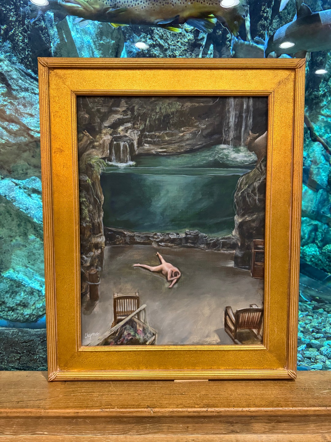 Bass Pro Shop Guy on the Ground After Swimming in the Fish Tank. Artist ...