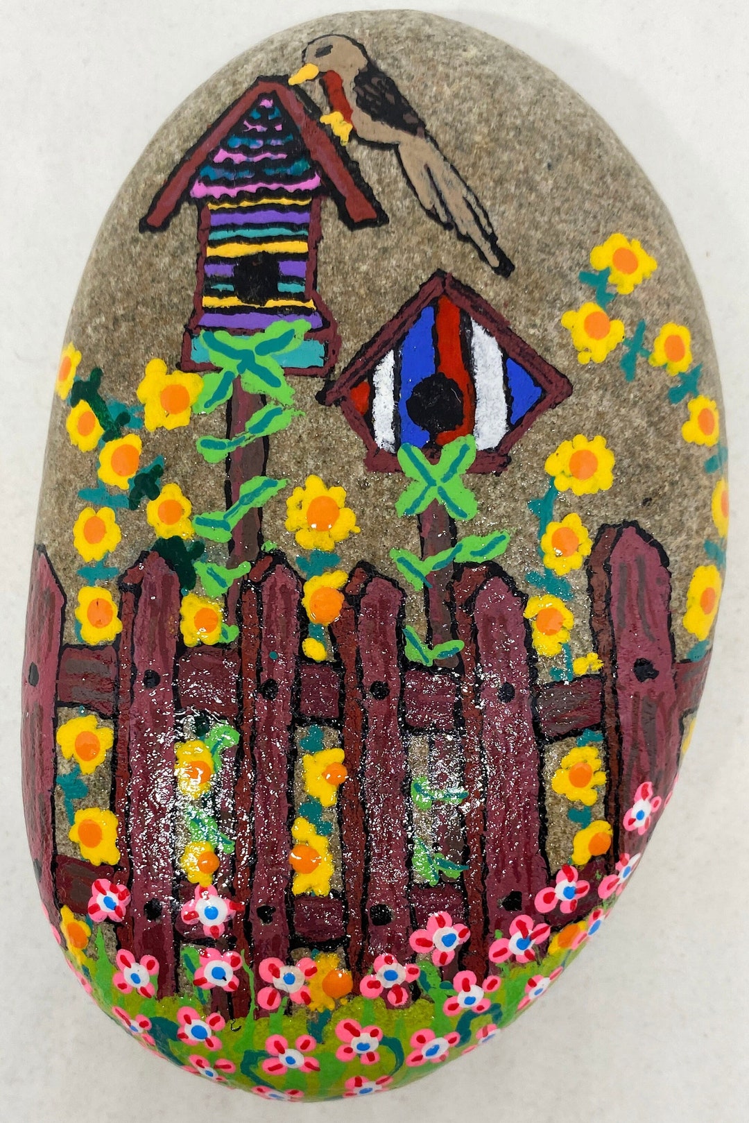 Painted Rocks pebble Pets A Serene Garden Scene, With a Rustic Old ...