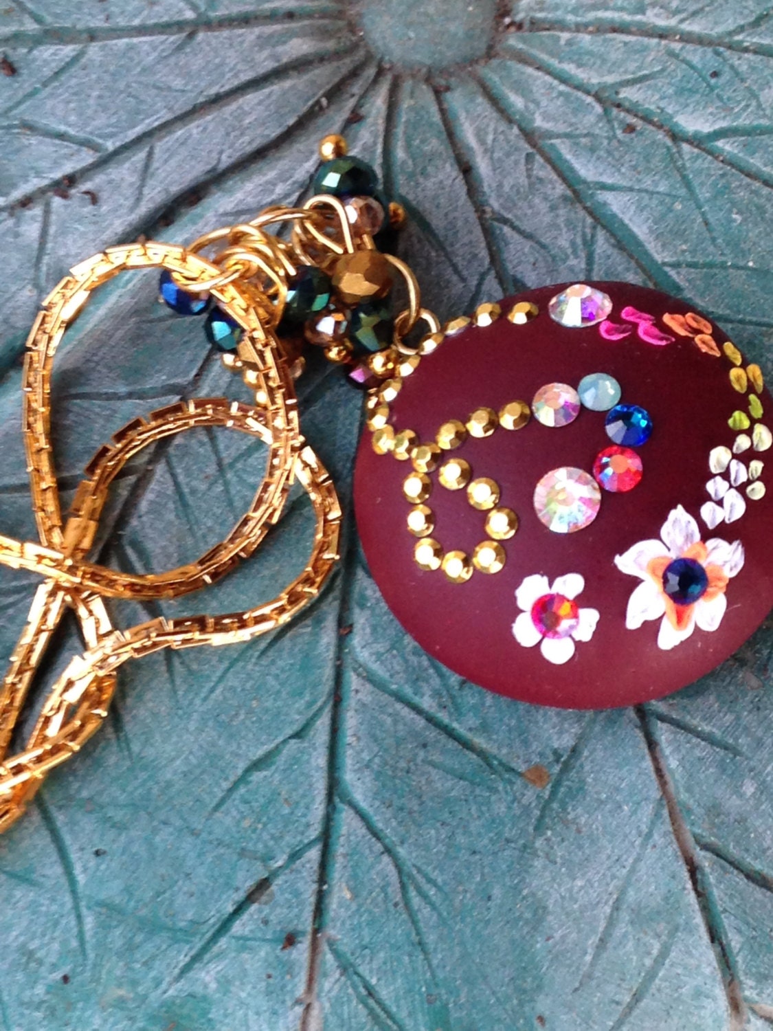 Deep Red Handmade Pendant With White Flowers, Crystal, and Gold Colored ...
