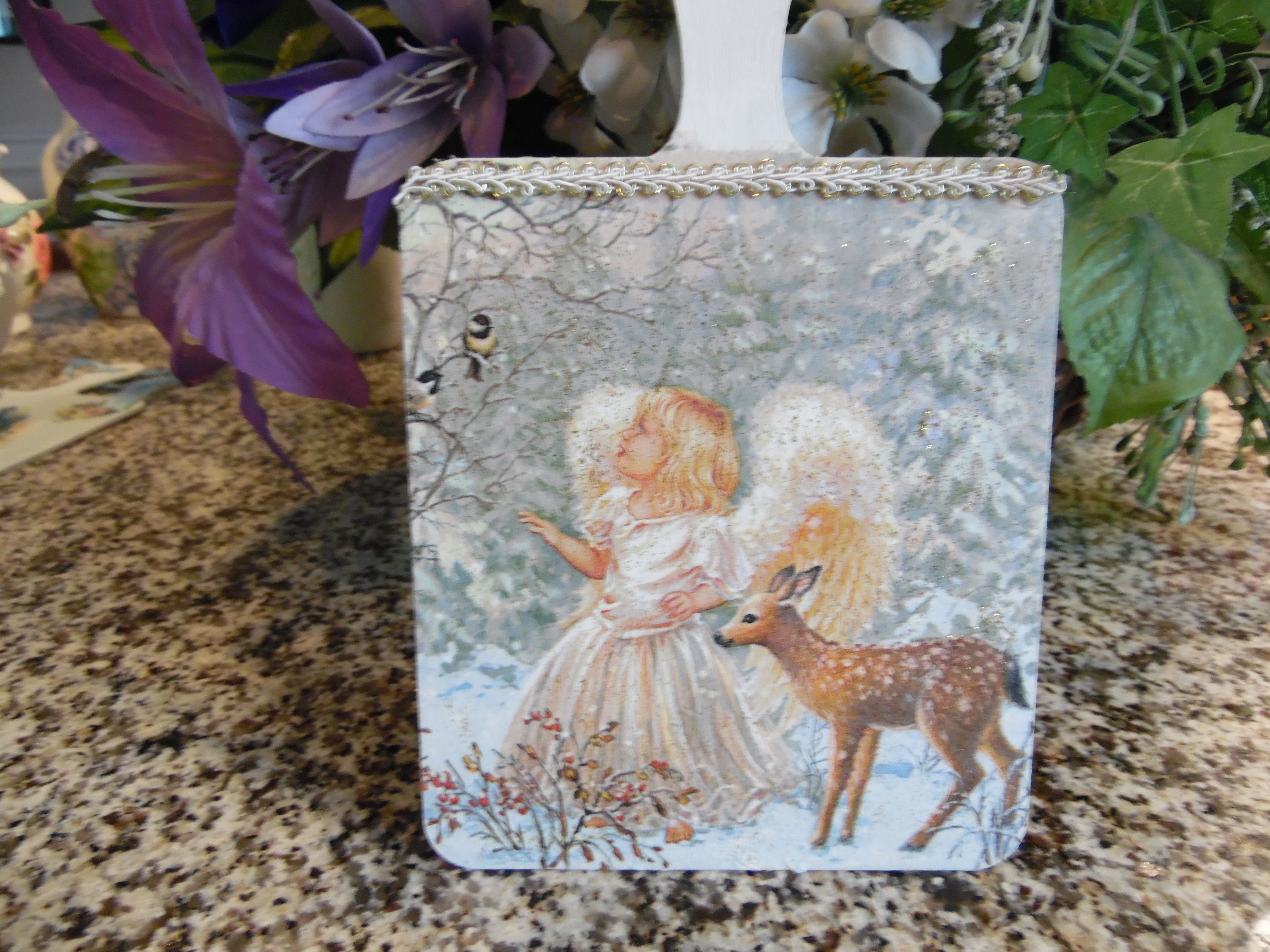 This is a Picture of a Little Girl Angel With a Baby Reindeer in the ...