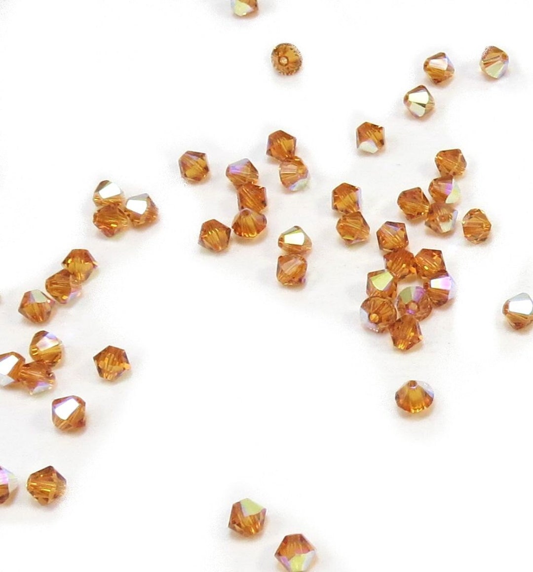 Cristallo Swarovski 4mm, 24 Topazi AB Cristallo Bicones, Bicones Giallo ...