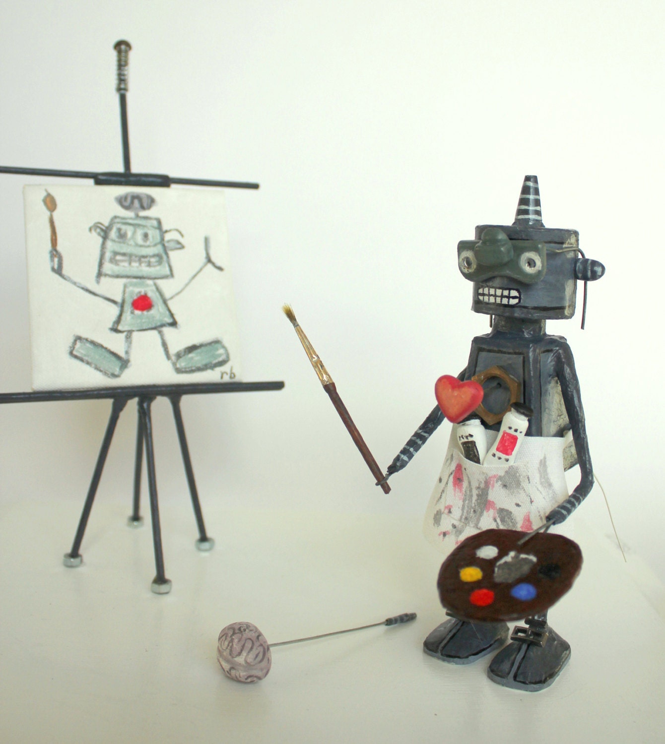 Artist Robot With Canvas, Paintings, Portfolio, Brush and Palette ...