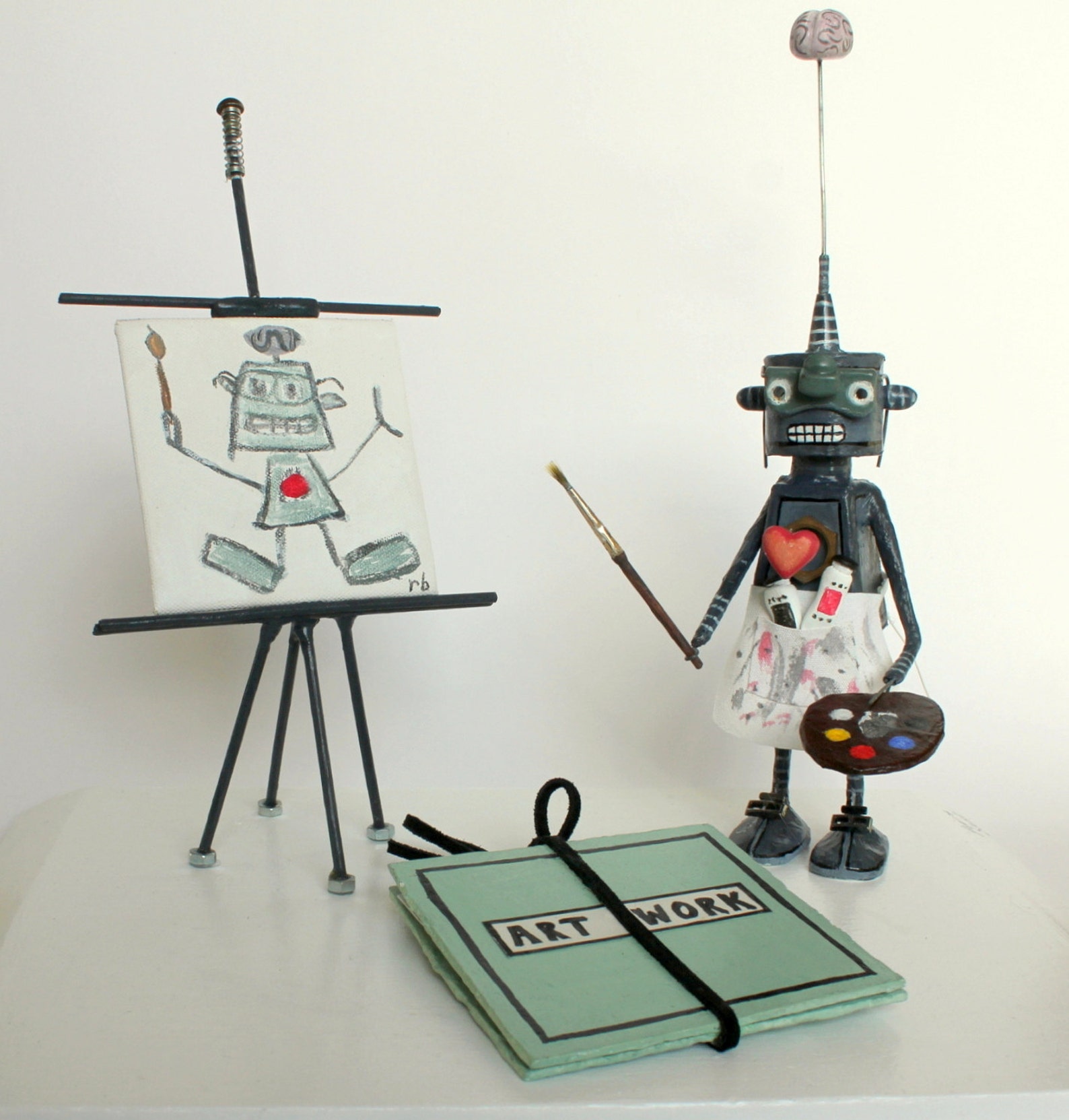 Artist Robot With Canvas, Paintings, Portfolio, Brush and Palette ...