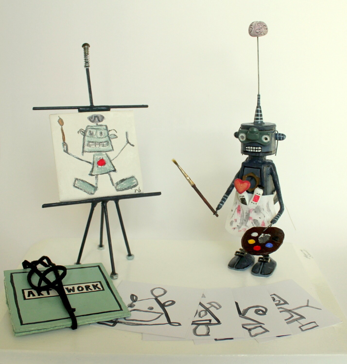 Artist Robot With Canvas, Paintings, Portfolio, Brush and Palette ...