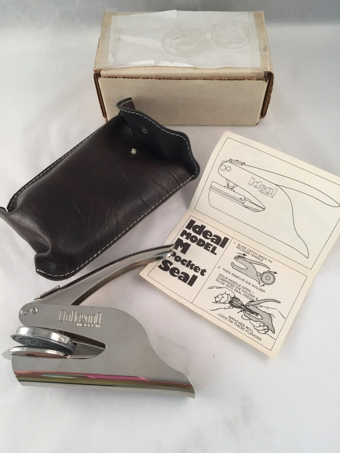 Vintage Hand Held Ideal Model M Pocket Seal, Heron Haus, Inc. Corporate ...