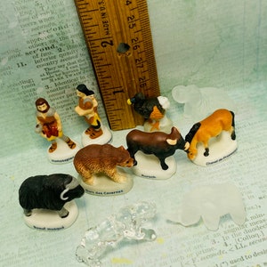 Prehistoric Man and Extinct Animals Wooly Mammoth Saber Tooth Tiger ...