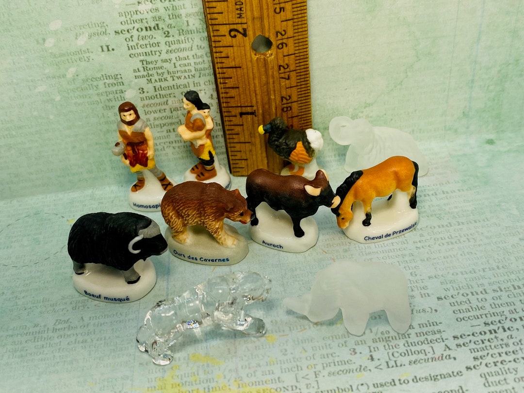 Prehistoric Man and Extinct Animals Wooly Mammoth Saber Tooth Tiger ...