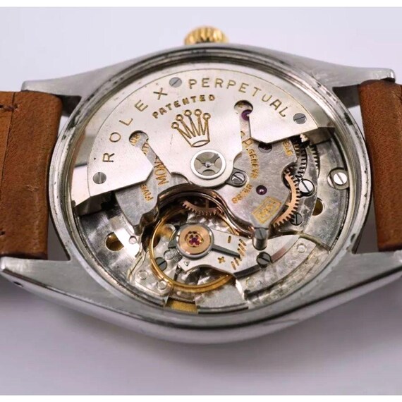 Rolex Oyster Perpetual 6564 Steel/18k Gold Steel Trop… - Gem