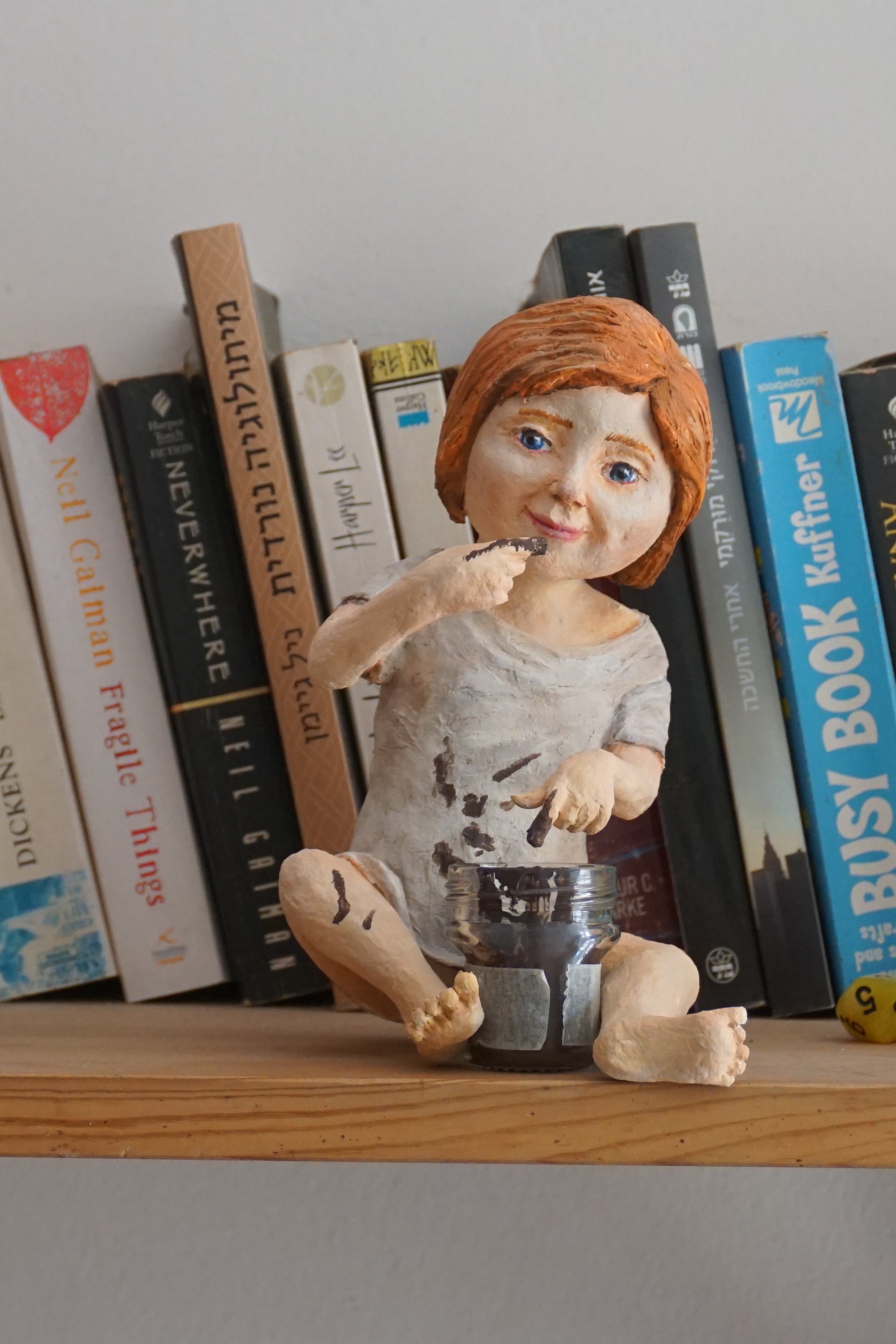 Paper mache sculpture of a young girl and her chocolate Figurines ...