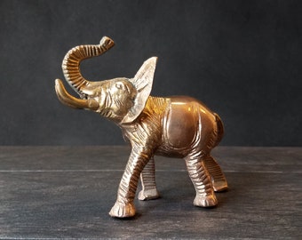 Gold animal figurine | Etsy
