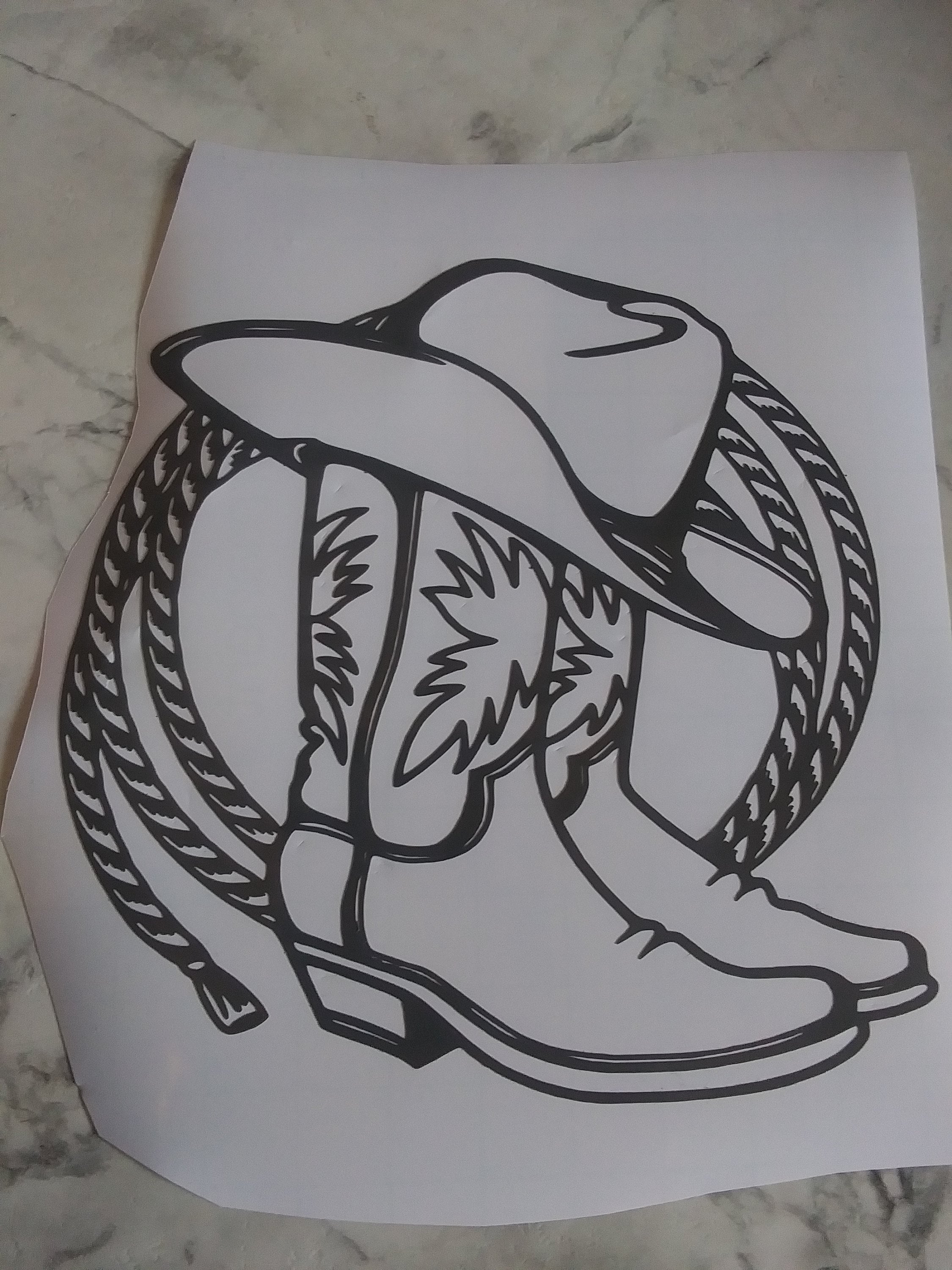 Cowboy Hat And Boots And Rope