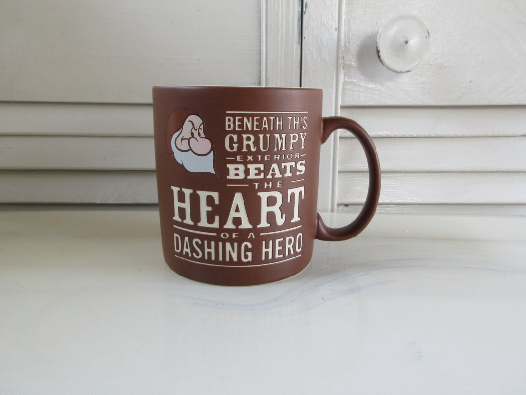 Grumpy Heart of a Dashing Hero Disney Parks Brown Engraved Coffee Mug ...