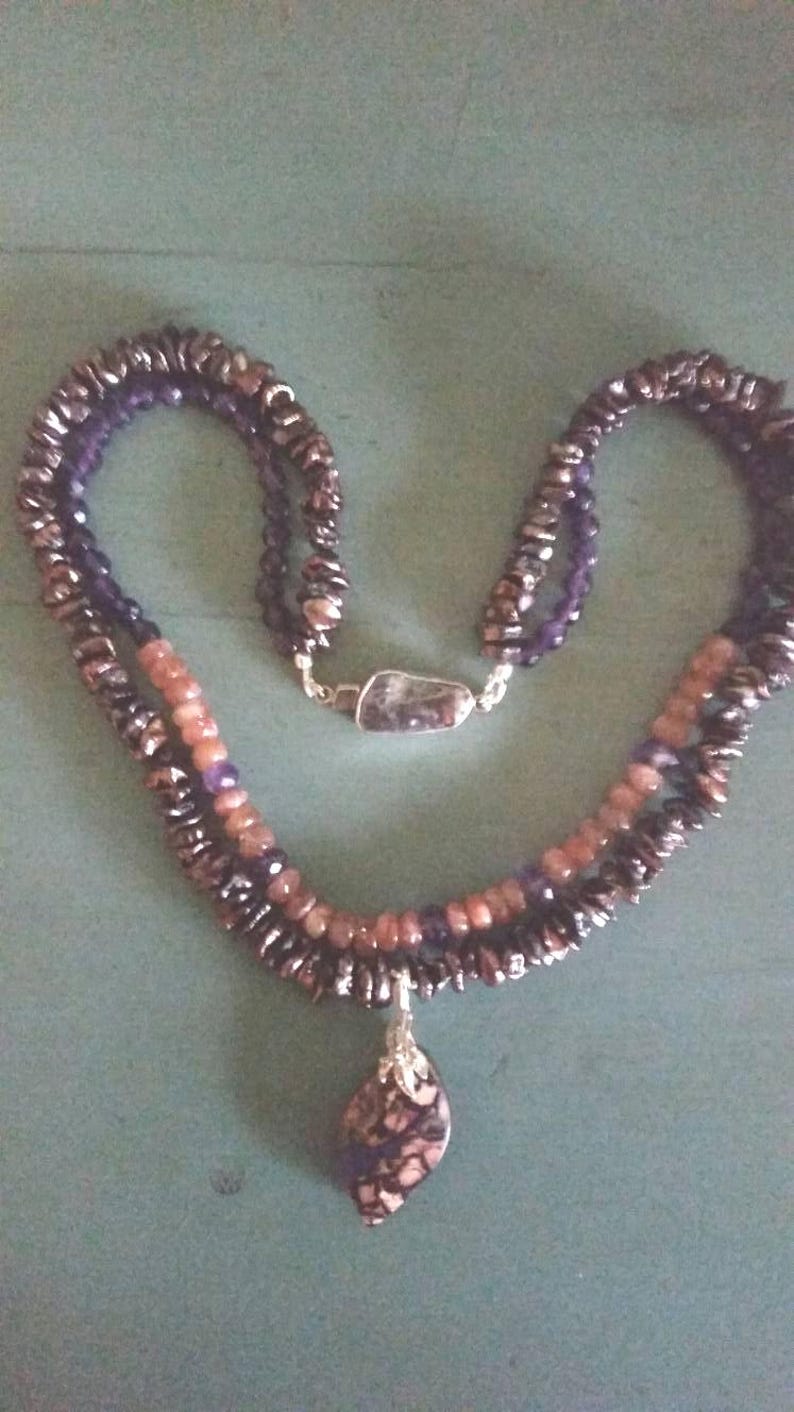 Sinuous Queensland Boulder Opal on Sculpted Silver, Strands of Bronze ...