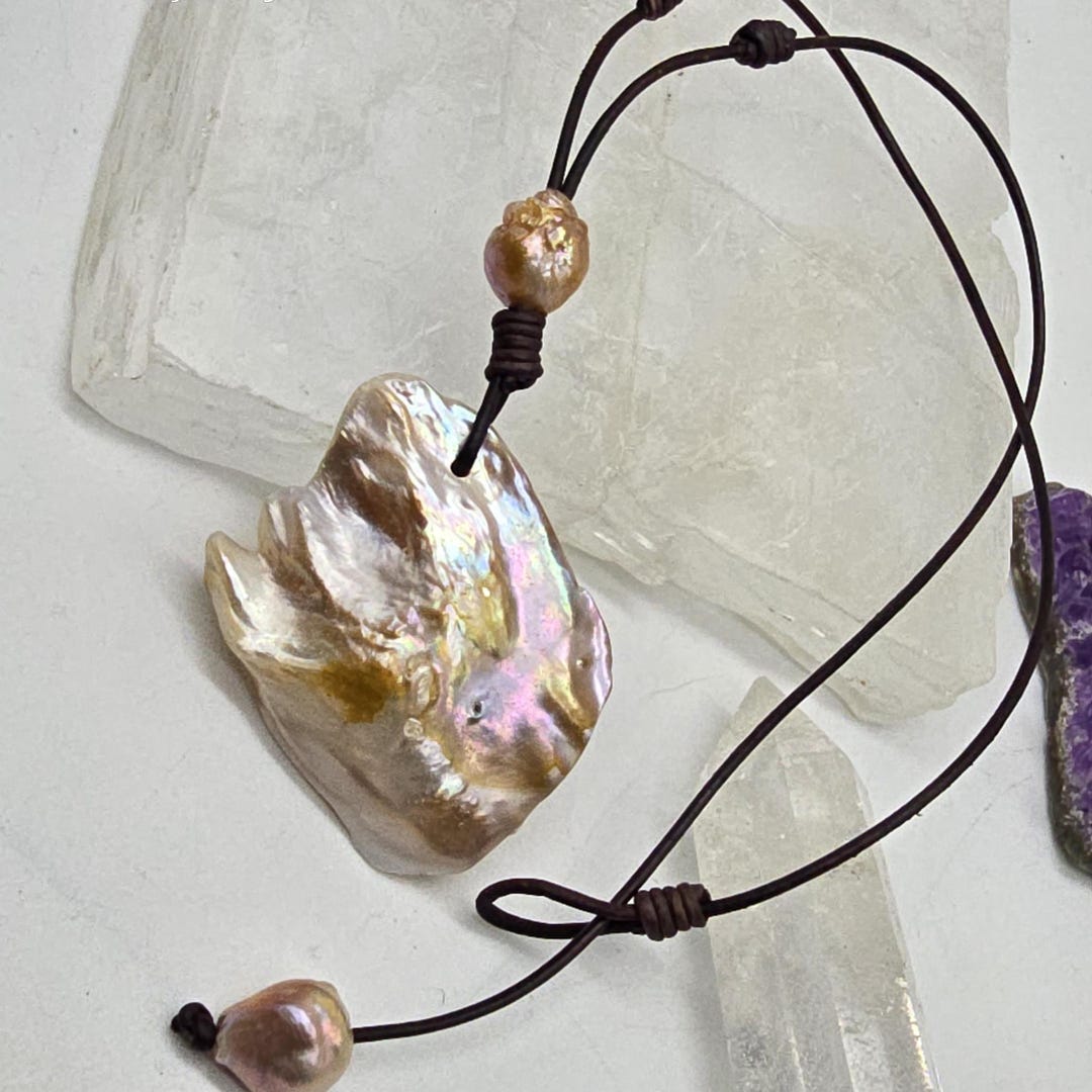 Heaven Sent: Angel Wing Pearl on Leather - Etsy