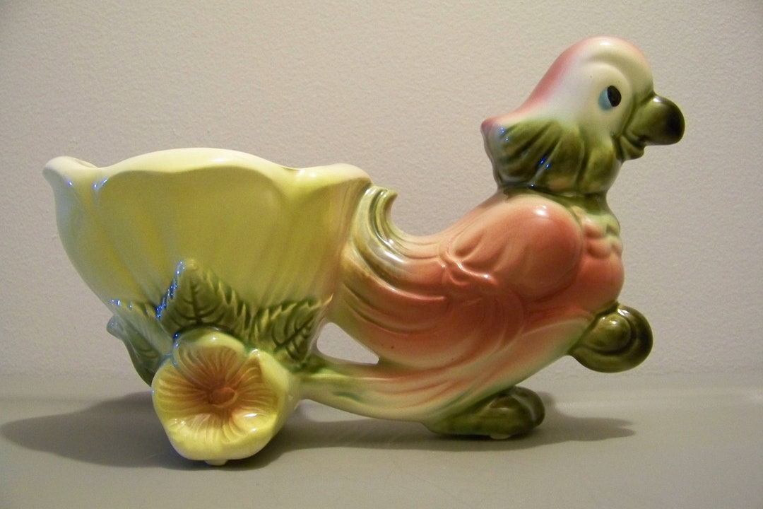 Parrot by Hull, Pulling Flower Cart. Pink and Yellow With Green ...