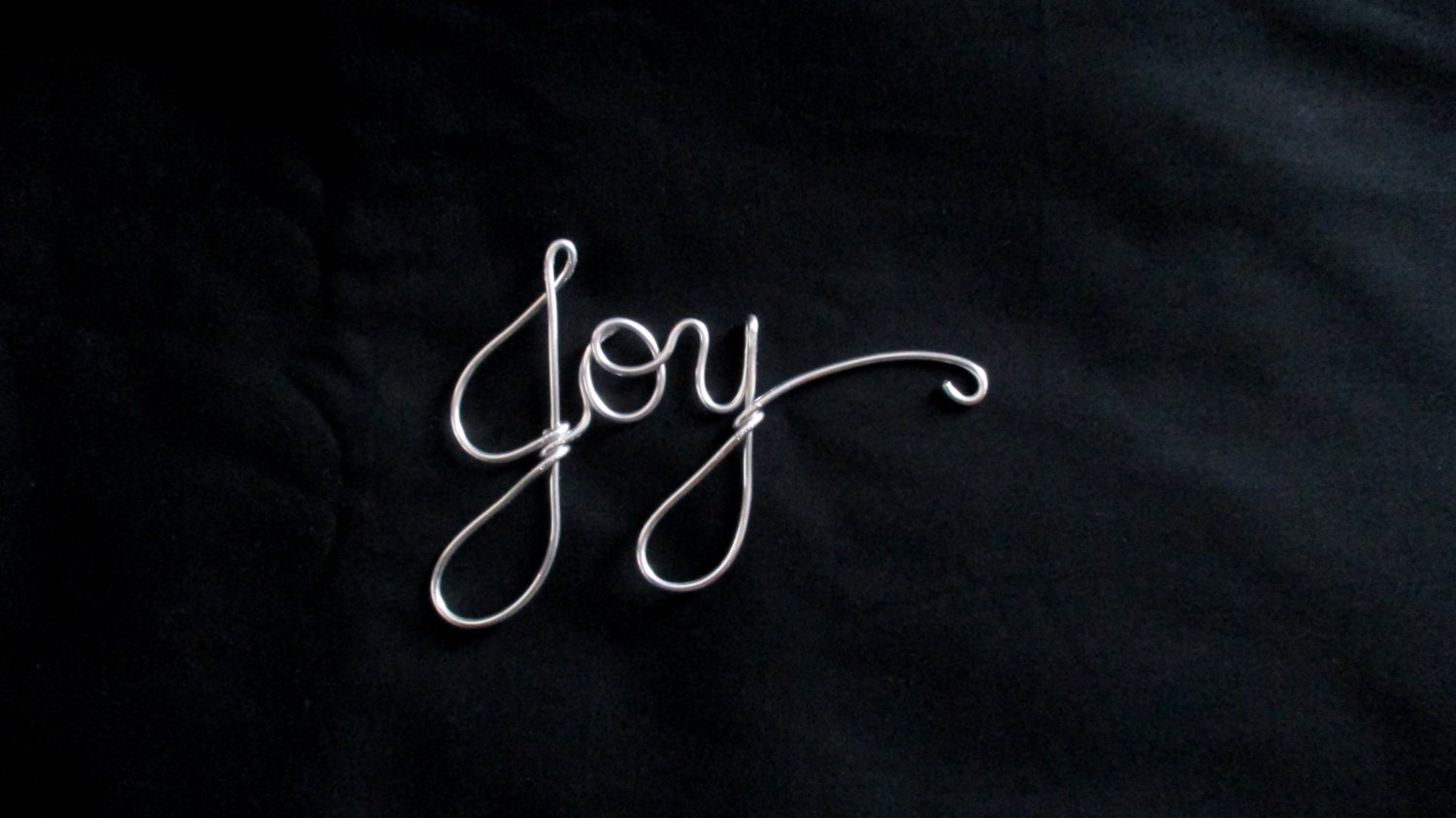 The Word Joy Cursive