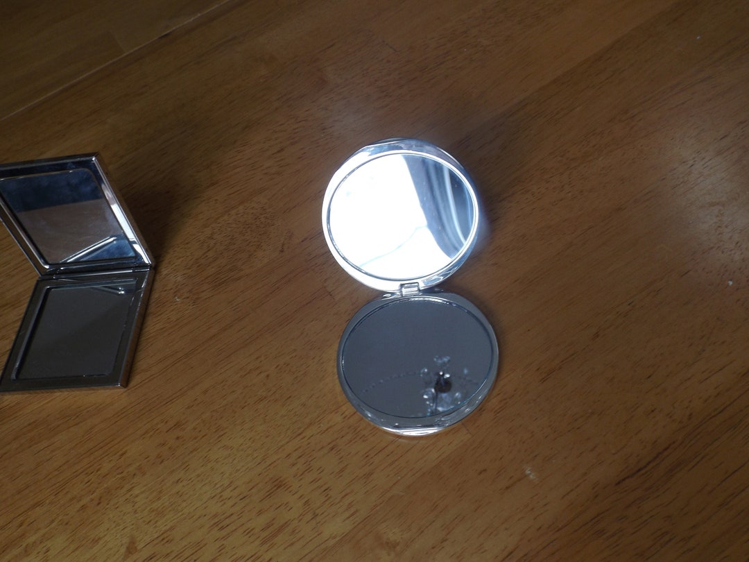 Round Compact Mirror 2 Mirrors Inside O ,one is Regular, One is ...