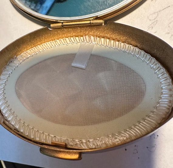 Bakelite and brass loose powder compact, circa 1940s,… - Gem