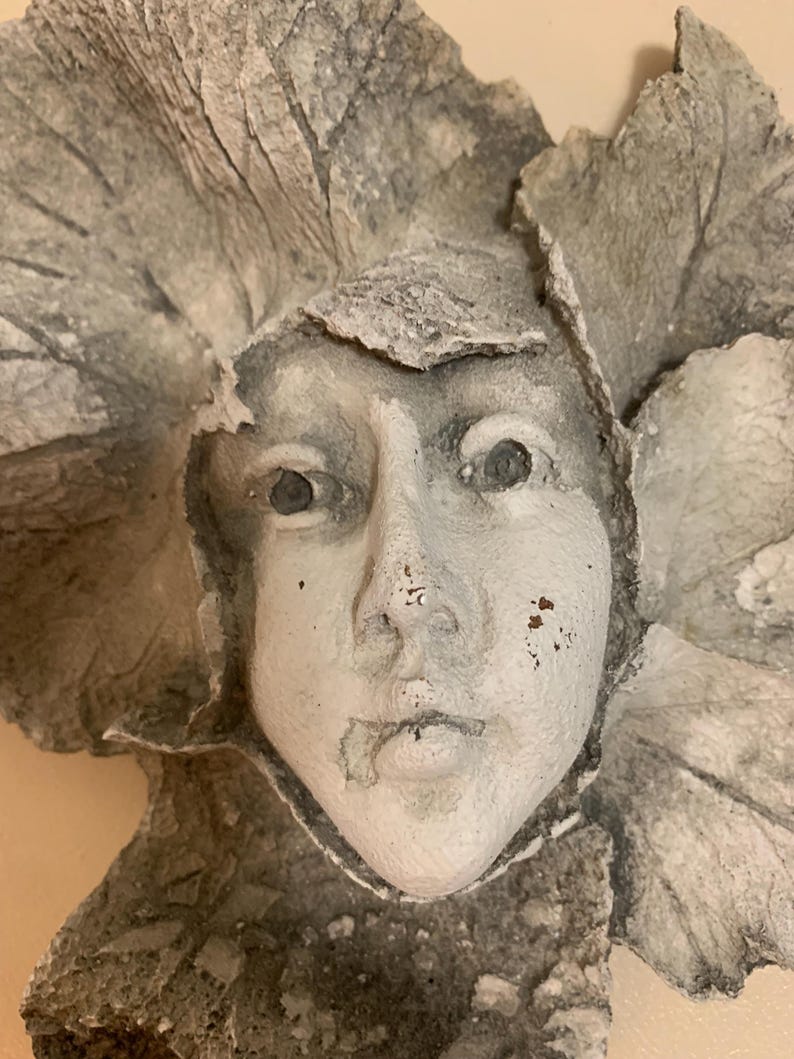 Stone Plaster Face Surrounded by Large Foliage Leaf Design Wall Hanging ...