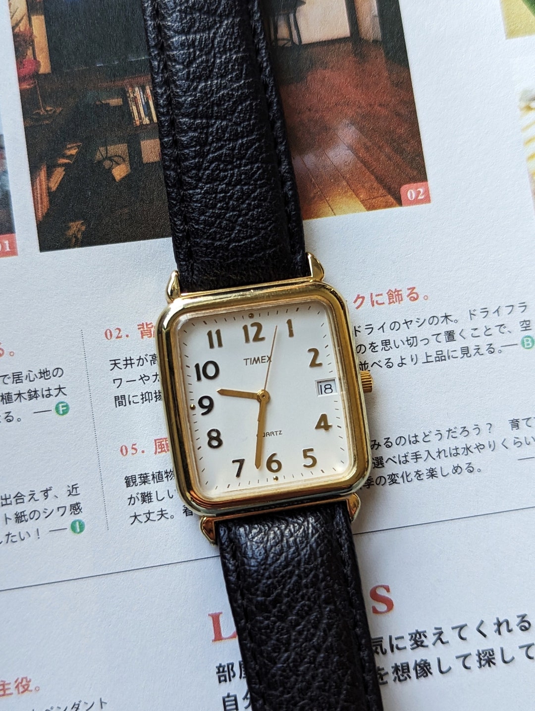 Vintage Timex Gold Tone Quartz Tank Watch With Black Leather Strap and ...